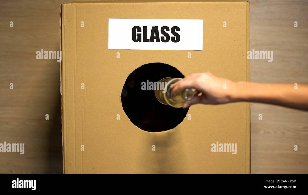 Glass written on box for disposing waste, people throwing trash inside ...