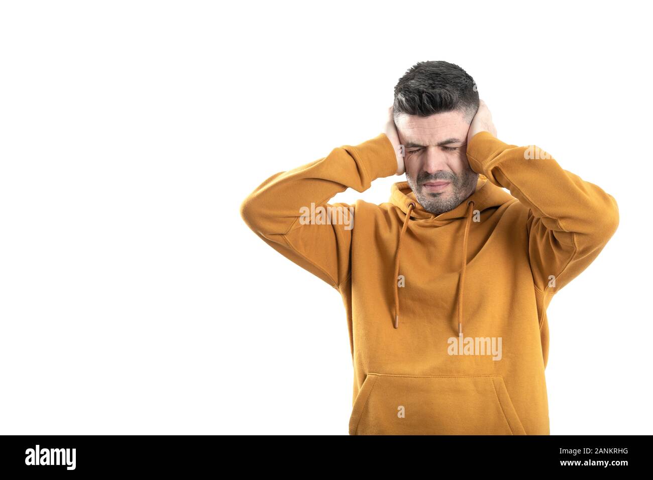 a man feels upset with excessive noise Stock Photo - Alamy
