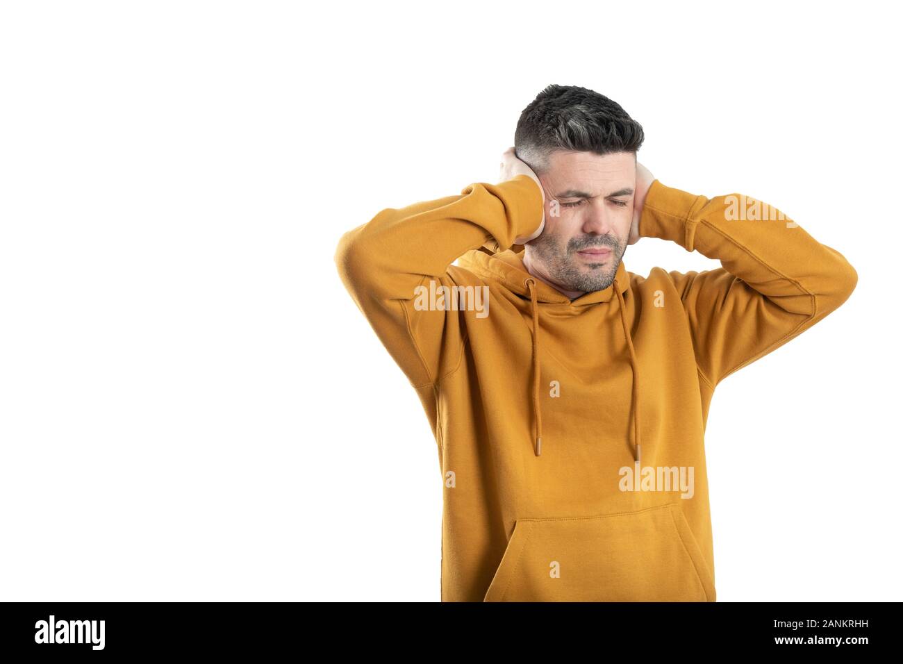 a man feels upset with excessive noise Stock Photo - Alamy