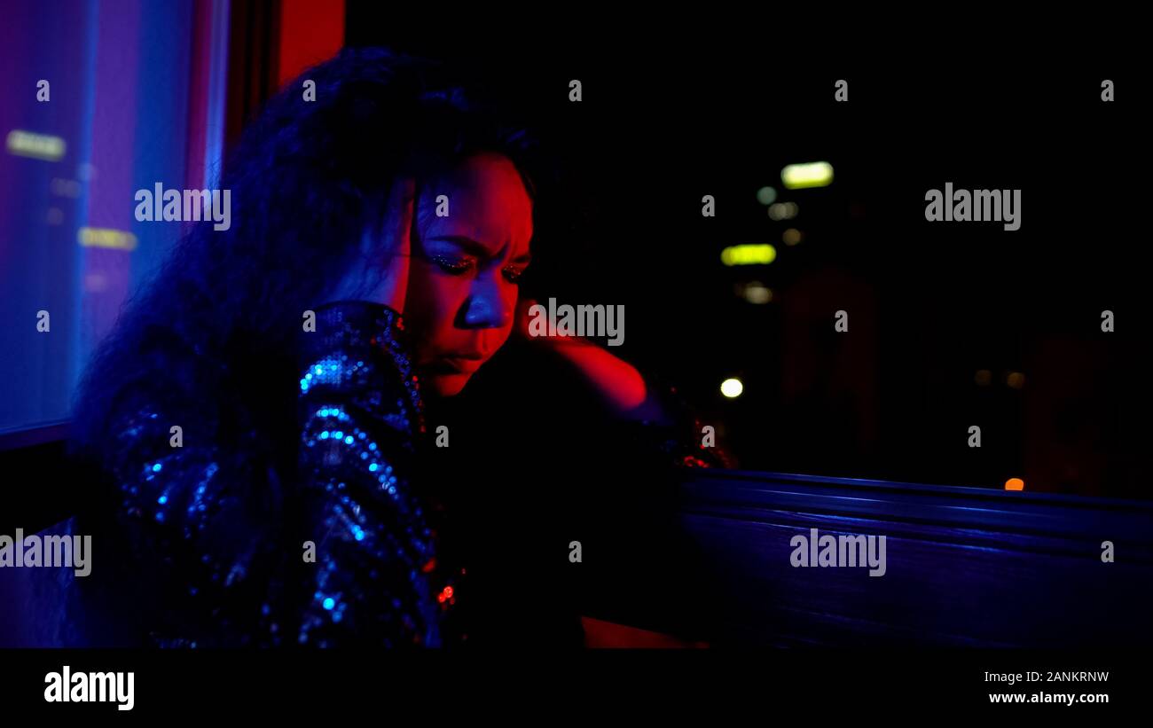 Glamorous woman suffering headache at private party, alcohol ...