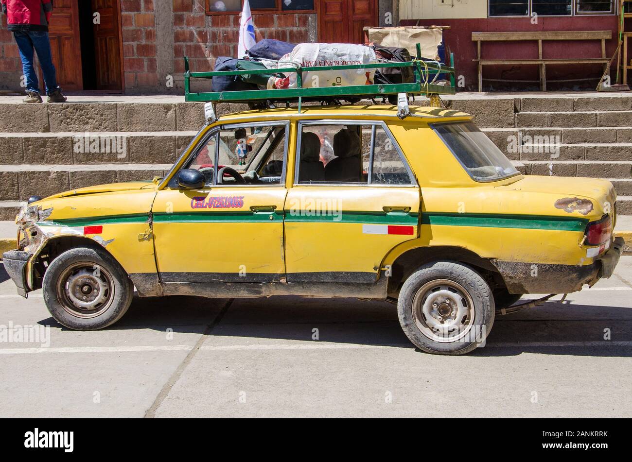 An old car in Lares, Peru, the starting point of the famous Lares Trek ...