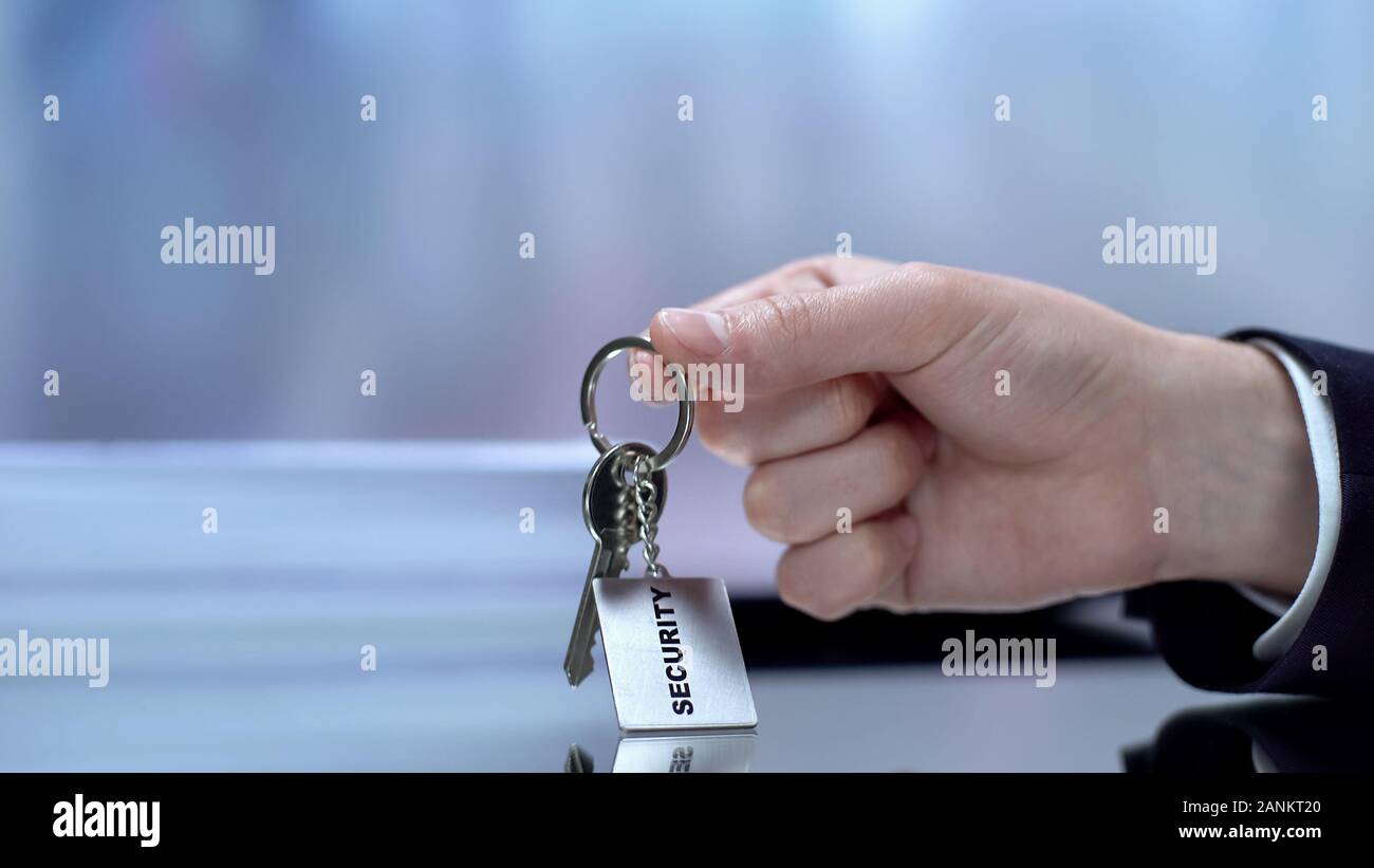 Security written on keychain male demonstrating, secrecy and safety ...