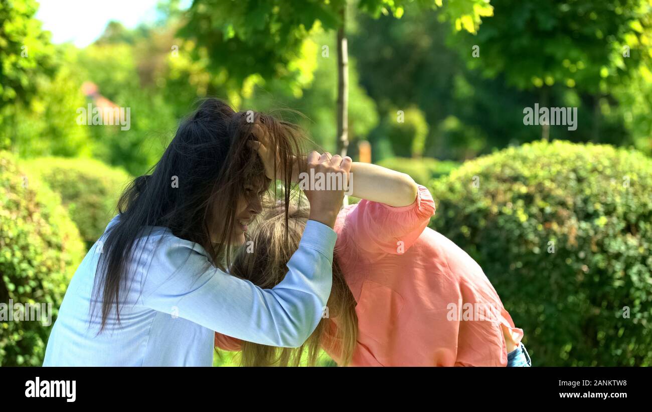 Two jealous women fighting hi-res stock photography and images - Alamy
