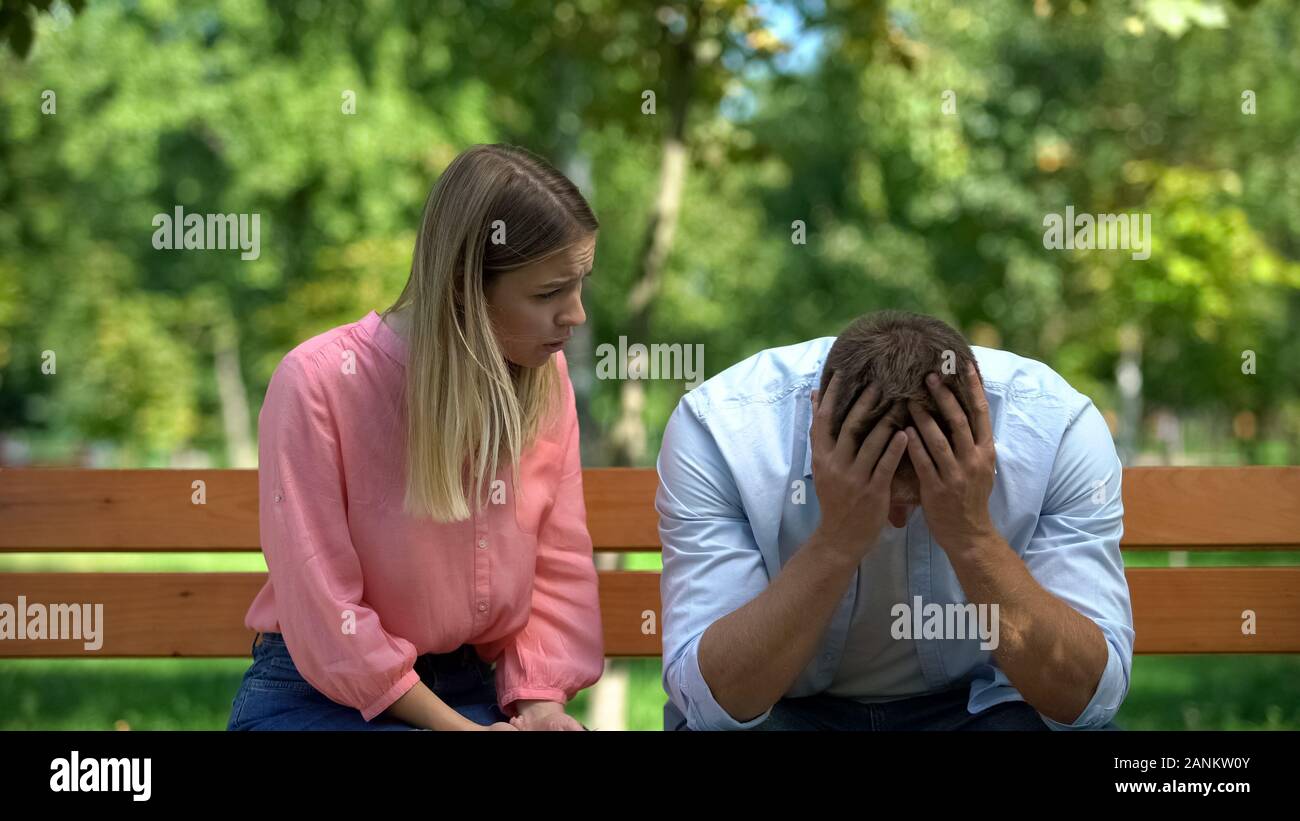 Desperate male ignoring arguing girlfriend, relations crisis ...