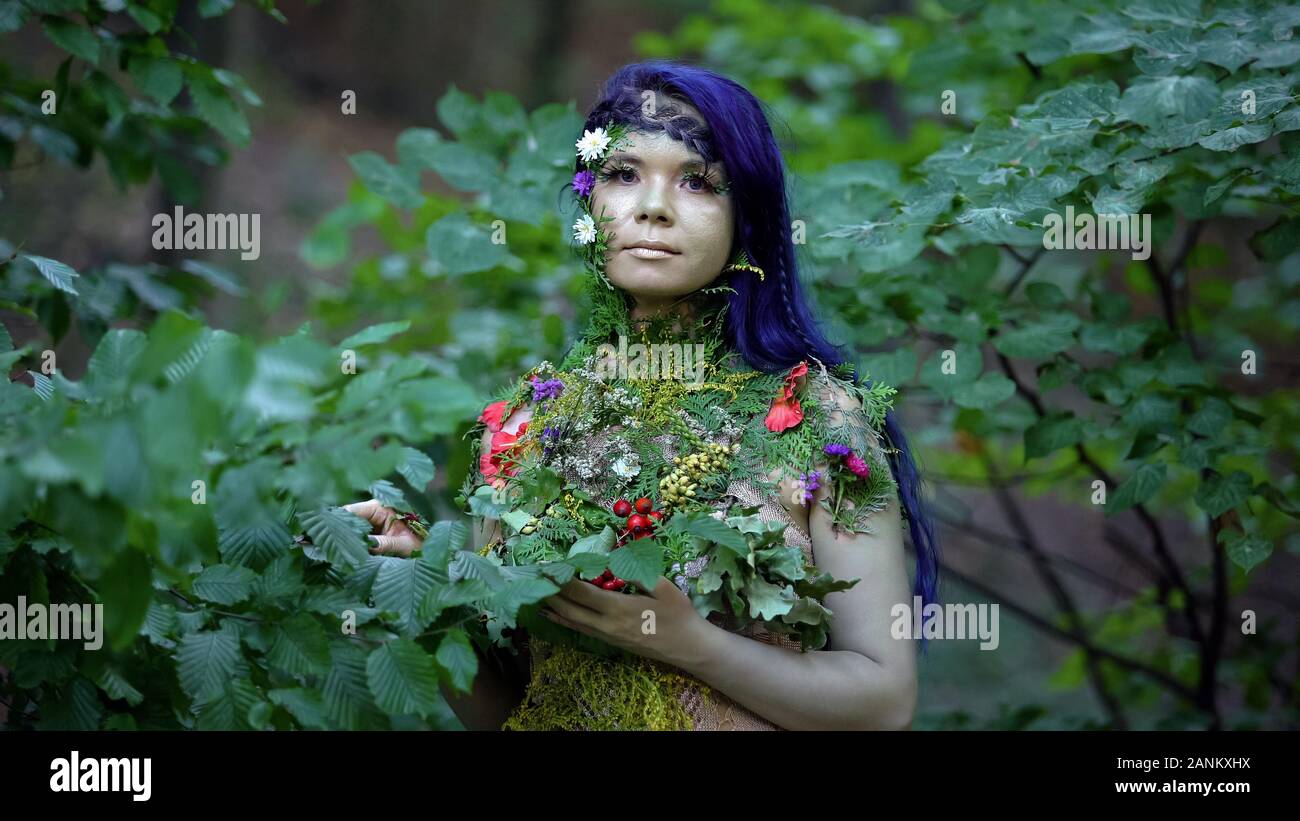 Personification mother earth among trees hi-res stock photography and ...