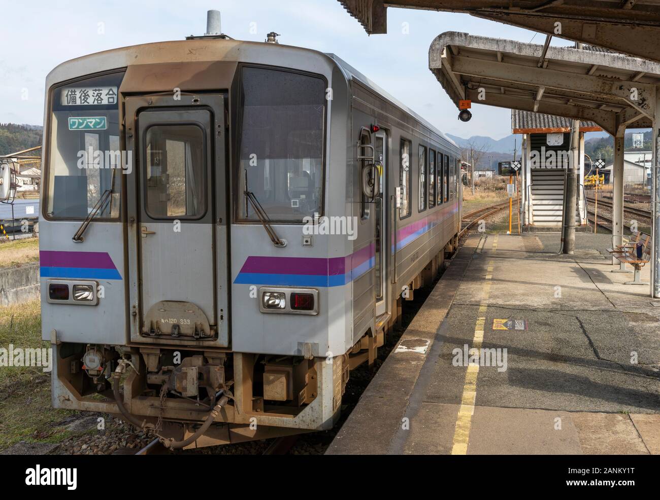 A JR West KiHa 120 Series train at Bingo-Shobara Station on the Geibi ...