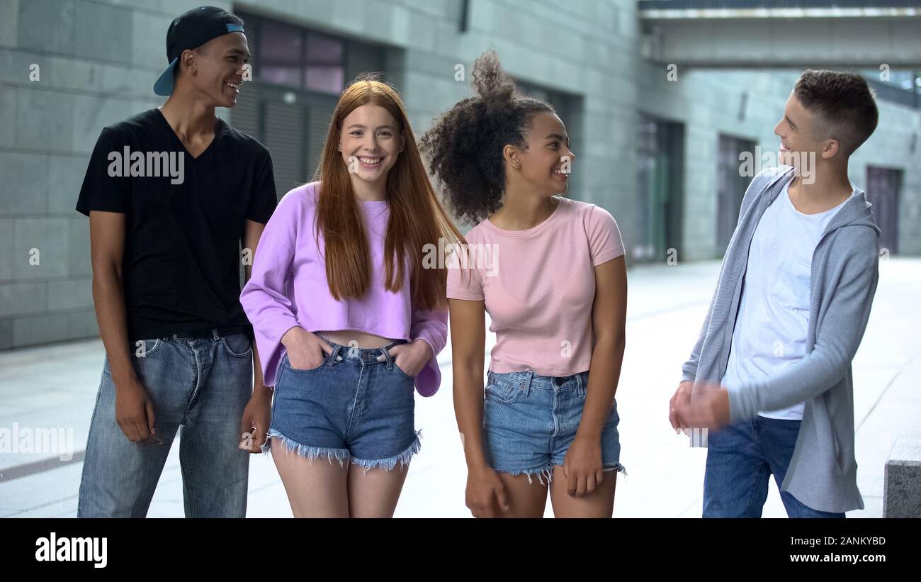 Happy stylish teenagers outdoors, adolescence positivity, cheerful ...