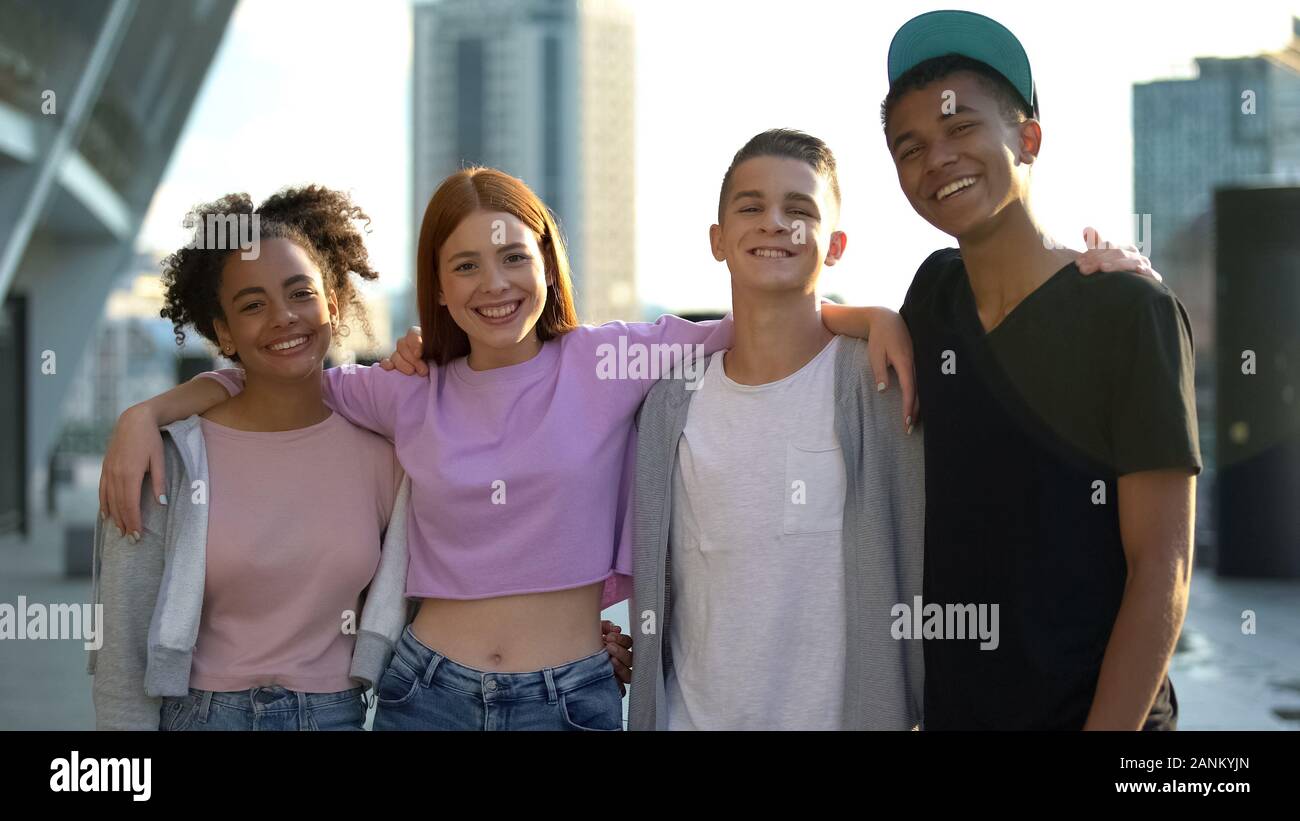 People hugging multi racial hi-res stock photography and images - Alamy