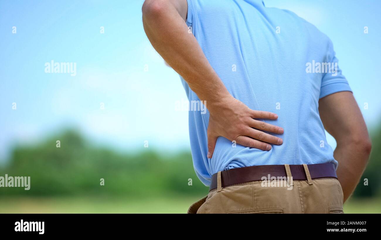 Lower back pain male hi-res stock photography and images - Alamy