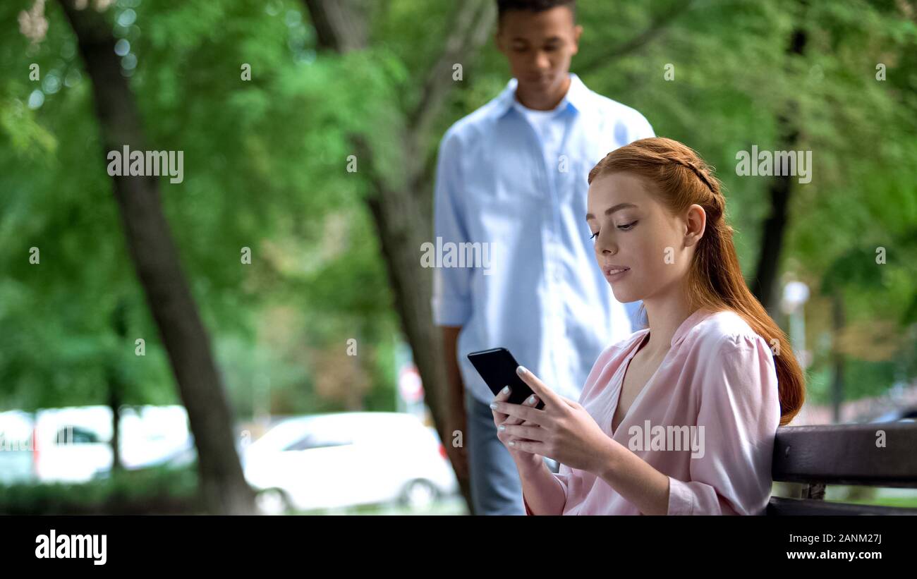 Teen boy and girl chatting hi-res stock photography and images - Alamy