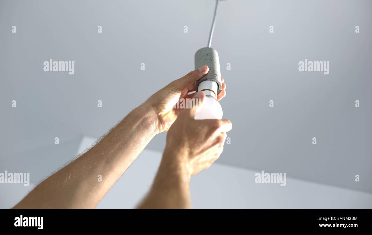 Changing light bulb hi-res stock photography and images - Alamy