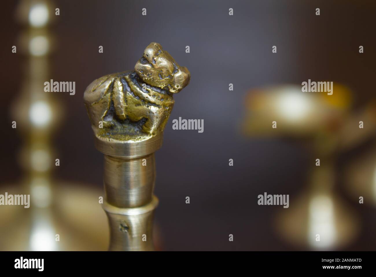 Close view of the cow symbol on top of Pooja bell. It is used to make ...