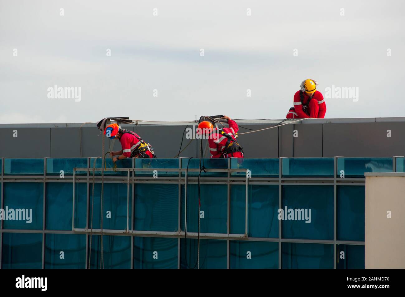 Windows Cleaning on City Building Stock Photo - Alamy