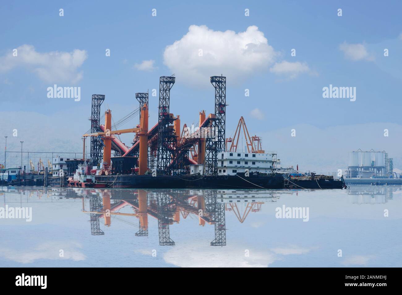 Sand tanker at the sand loading station with loader Stock Photo - Alamy