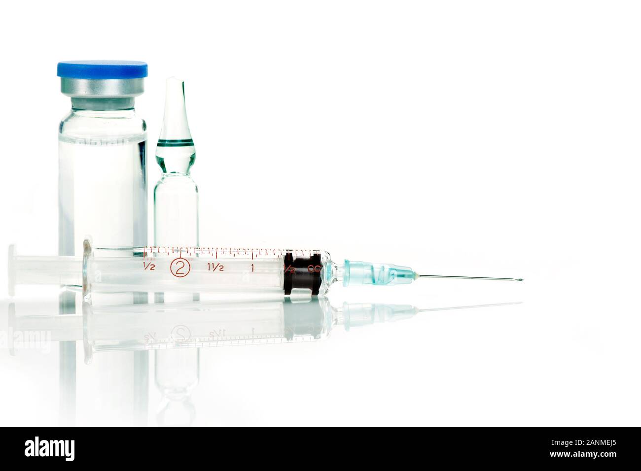 Clear vial and medication ampule isolated on white with syringe Stock ...