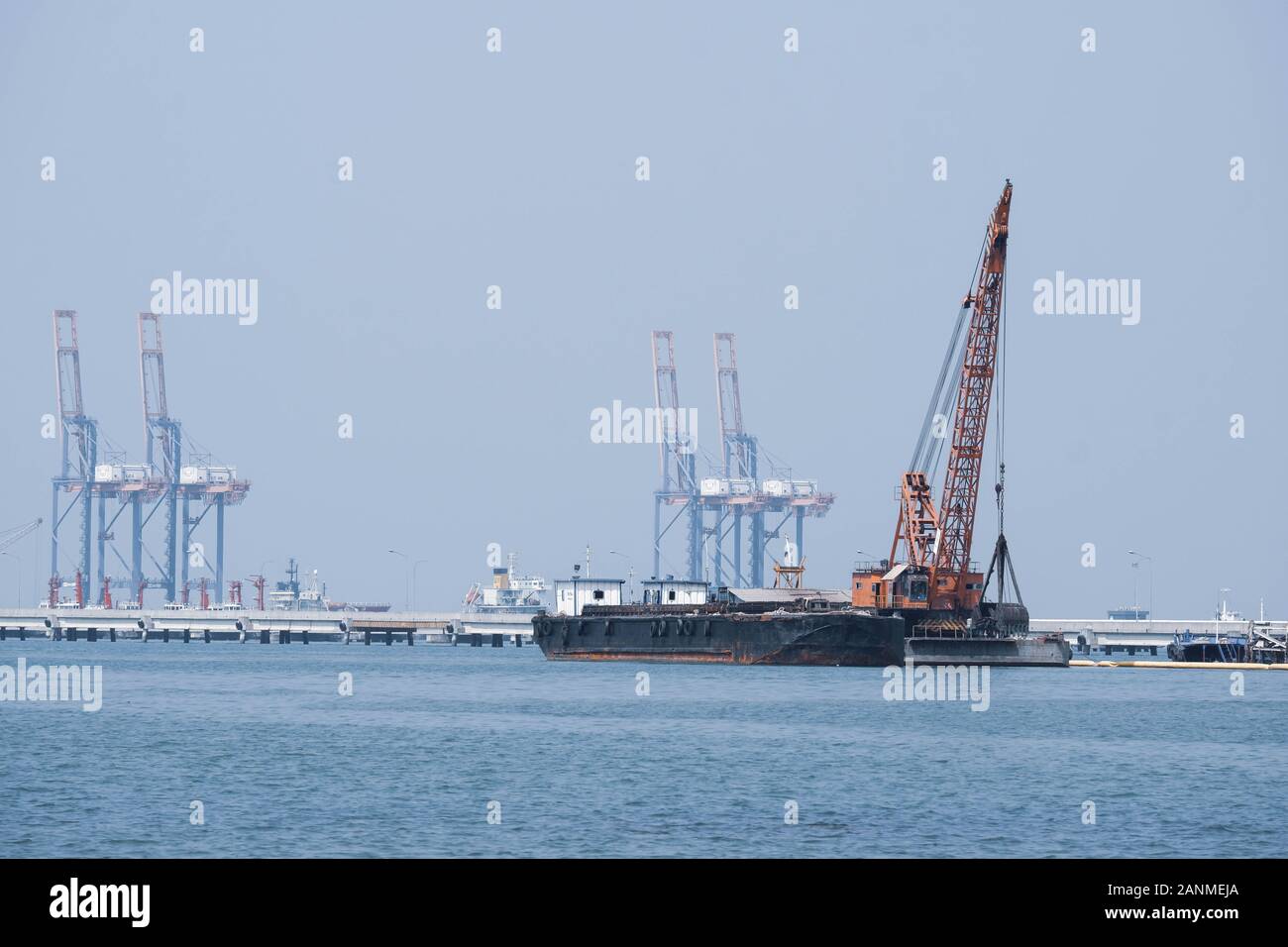 Sand tanker at the sand loading station with loader Stock Photo - Alamy