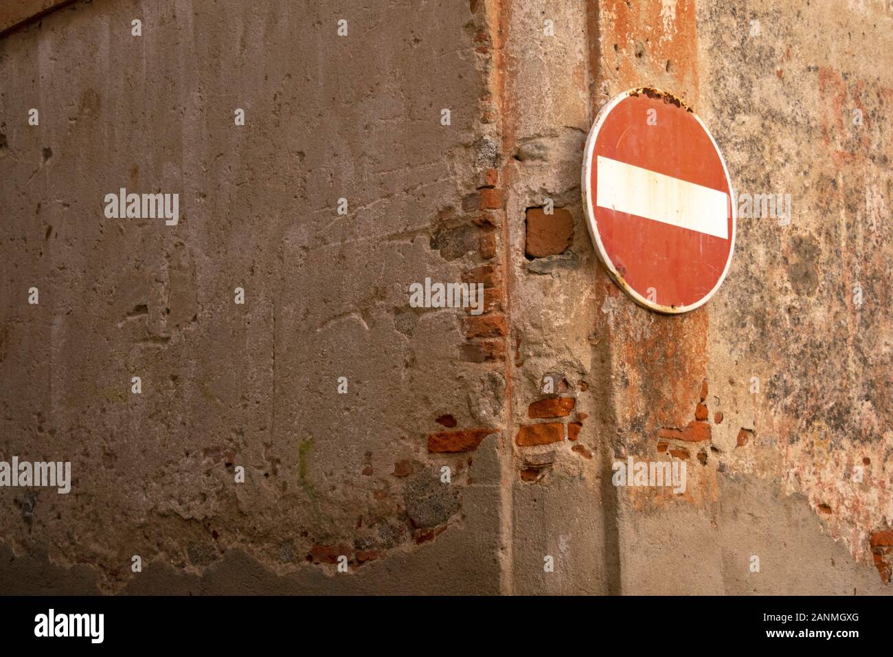 old peeling wall with rusty road sign Stock Photo - Alamy