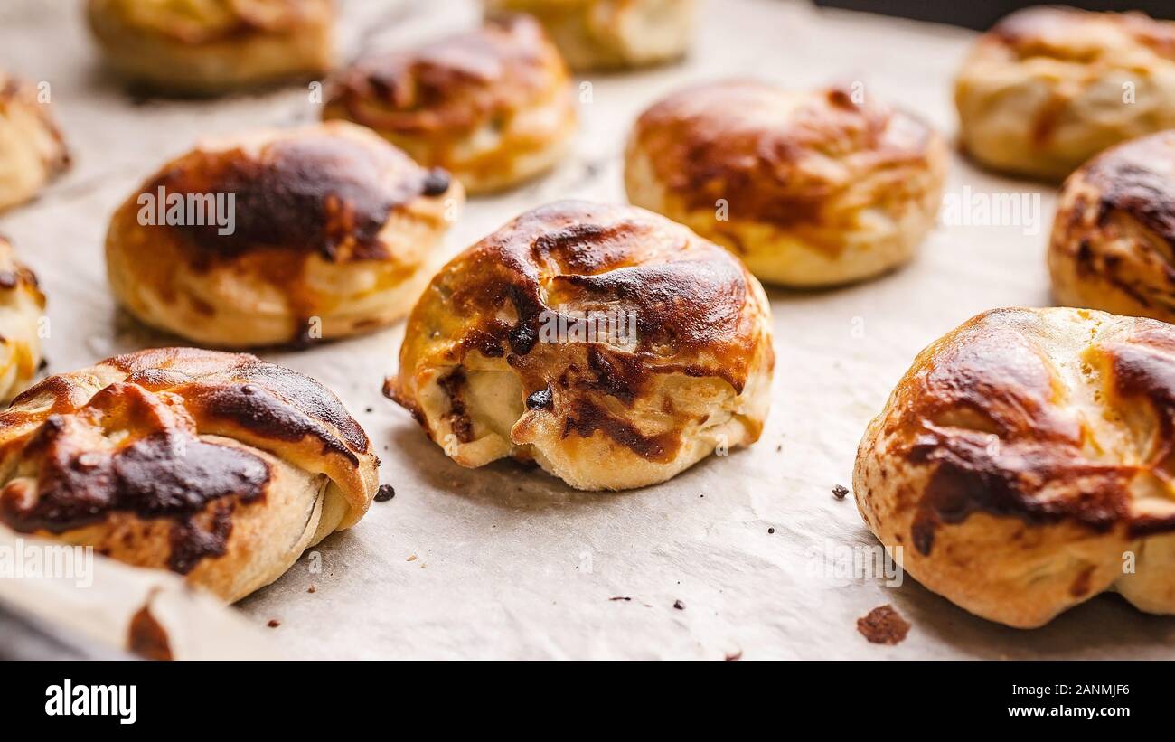 Food banner homemade sweet buns with salted caramel and nuts. Selective ...