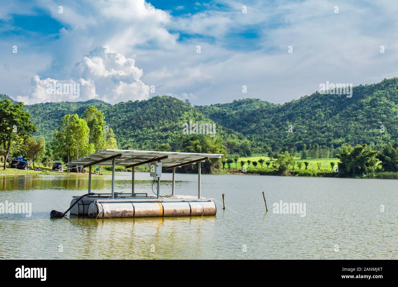 Solar cells floating in the water reservoirs and mountain views Stock ...