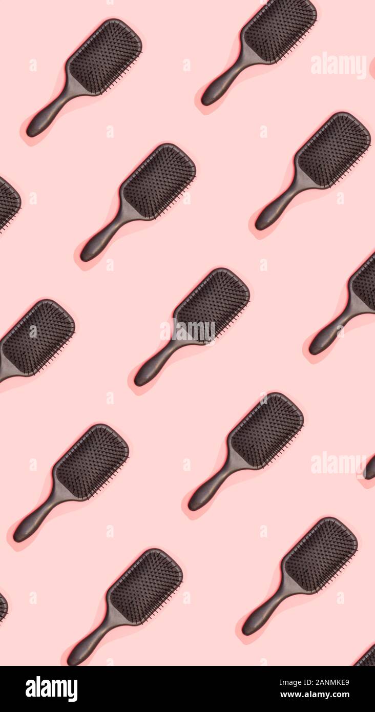 Hairdresser comb on a pink background. Seamless pattern Stock Photo - Alamy