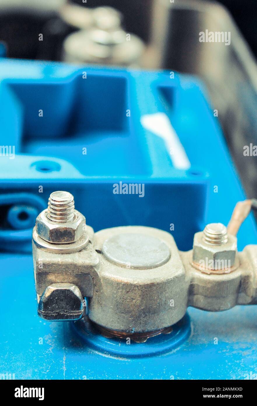 Cables connected to car battery under hood of car. Technology in ...