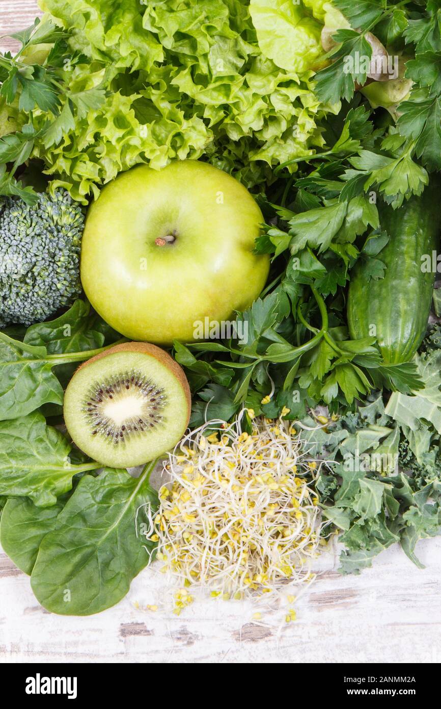 Fresh natural ripe green fruits with vegetables and sprouts. Healthy ...