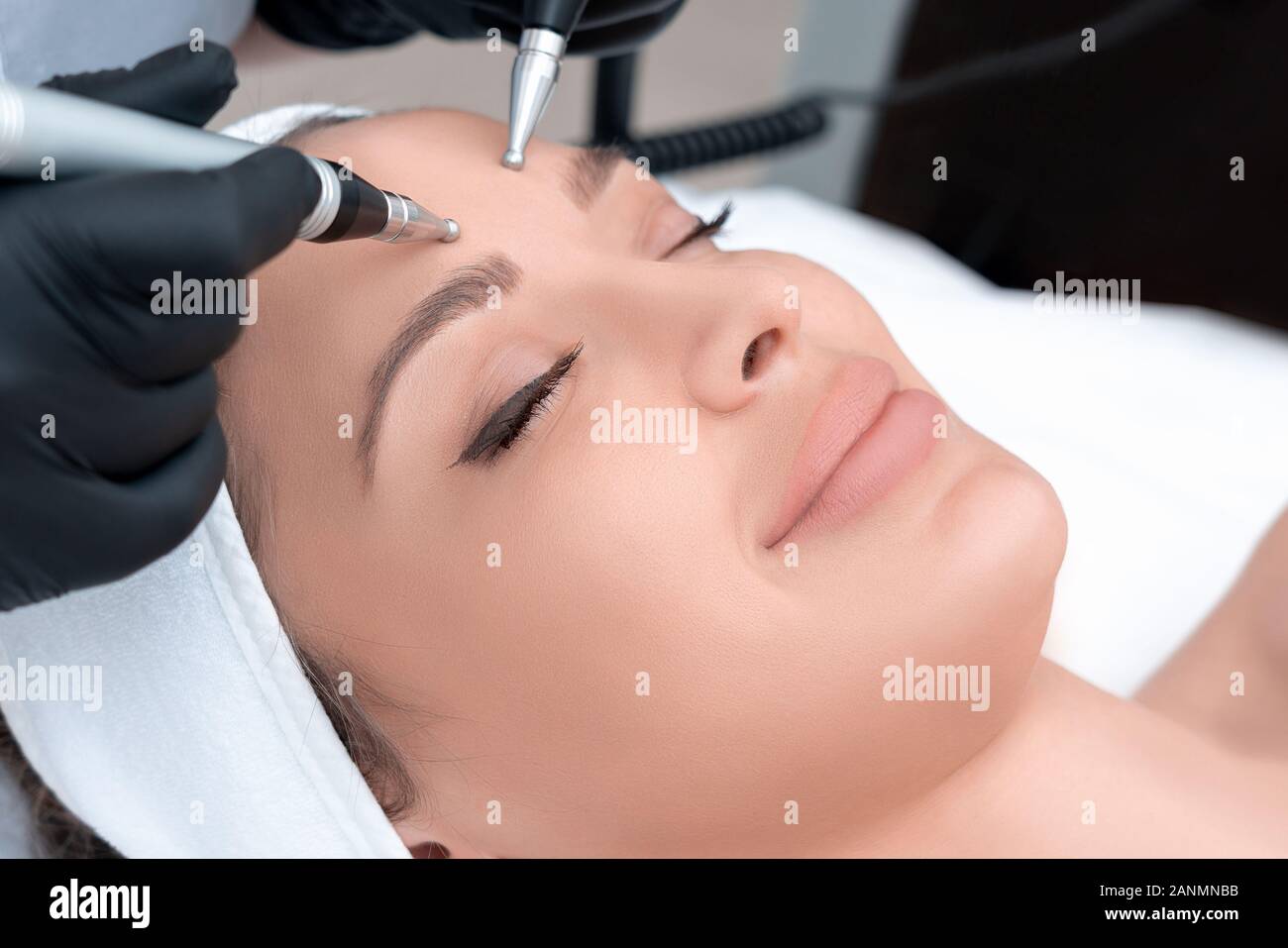 Cosmetology. Beautiful Woman At Spa Clinic Receiving Stimulating ...