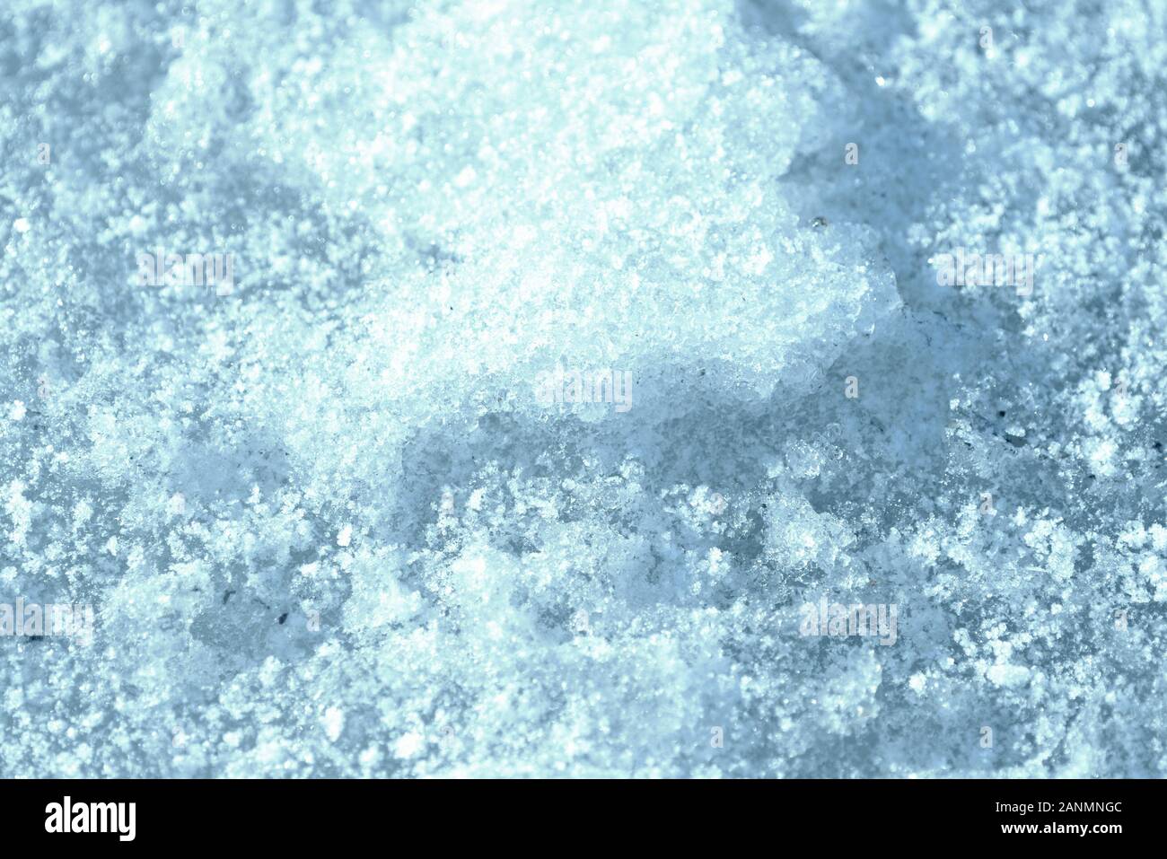 Wet spring snow texture close up. Natural abstract background blue ...