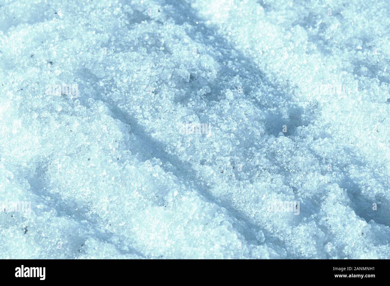 Wet spring snow texture close up. Natural abstract background blue ...