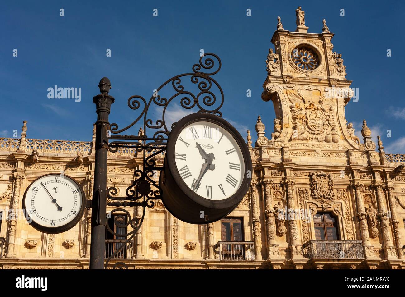 Decorative clocks in front of the facade of the Parador, Leon, Spain ...