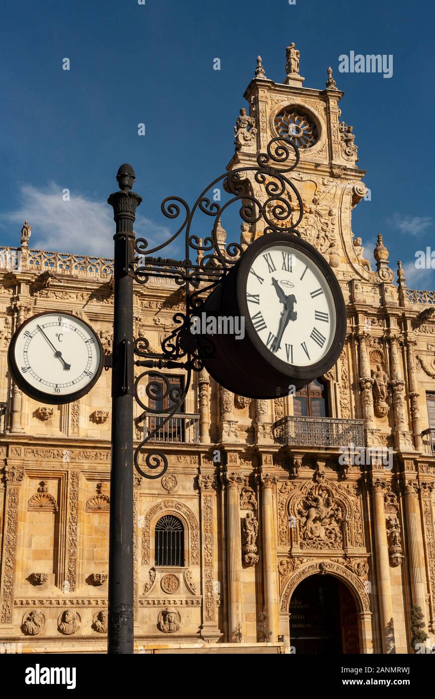 Decorative clocks in front of the facade of the Parador, Leon, Spain ...