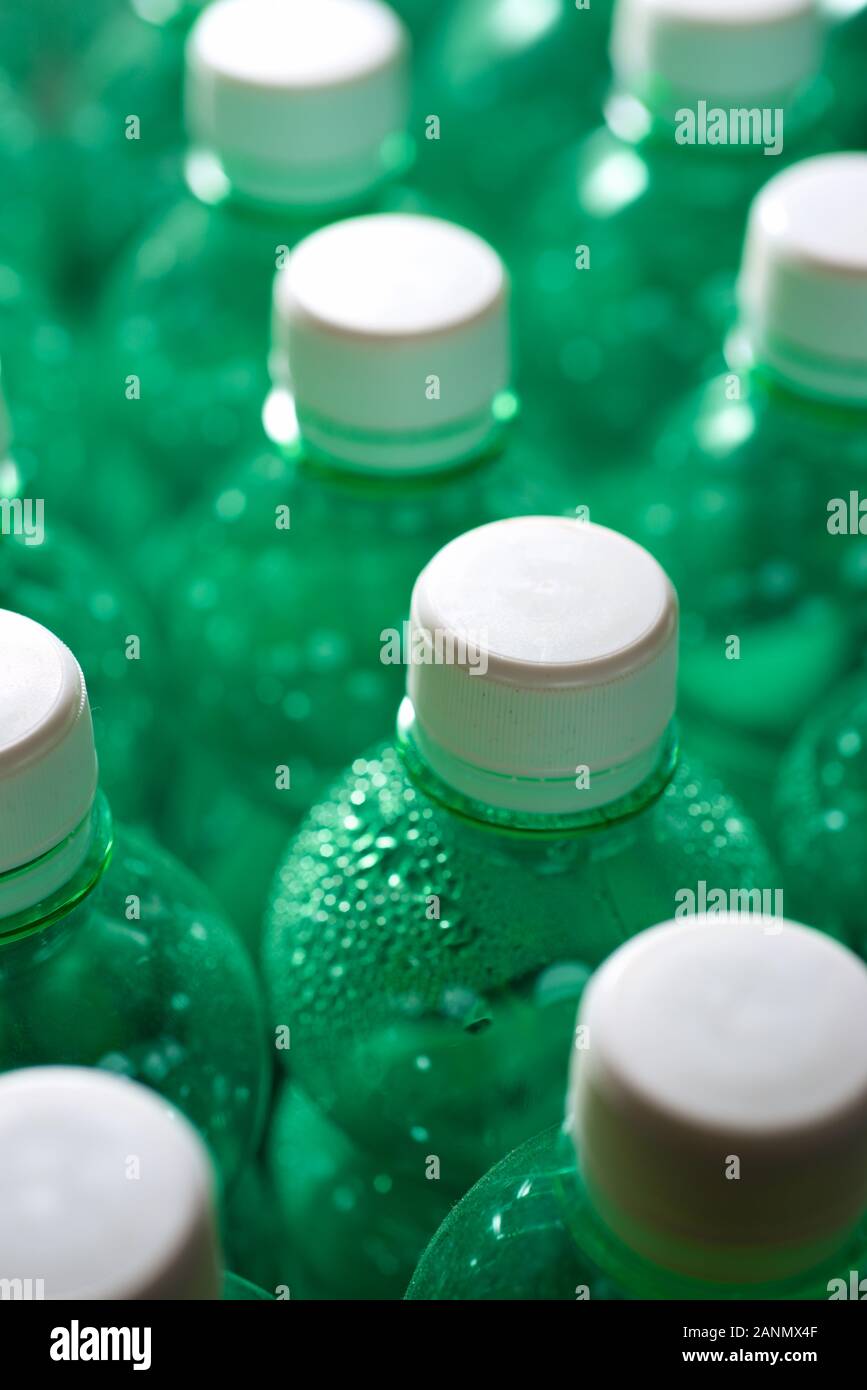 Water bottles in a row Stock Photo - Alamy