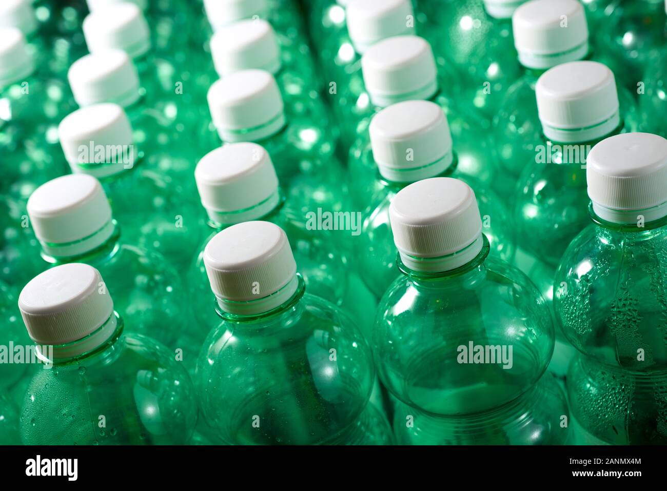 Water bottles in a row Stock Photo - Alamy