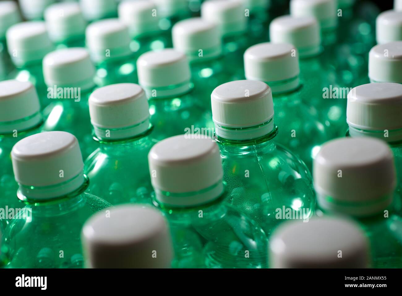 Water bottles in a row Stock Photo - Alamy