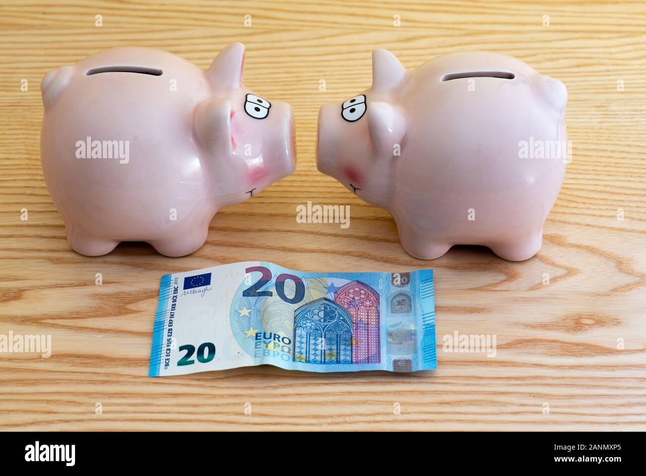Two piggies bank isolated on white Stock Photo - Alamy