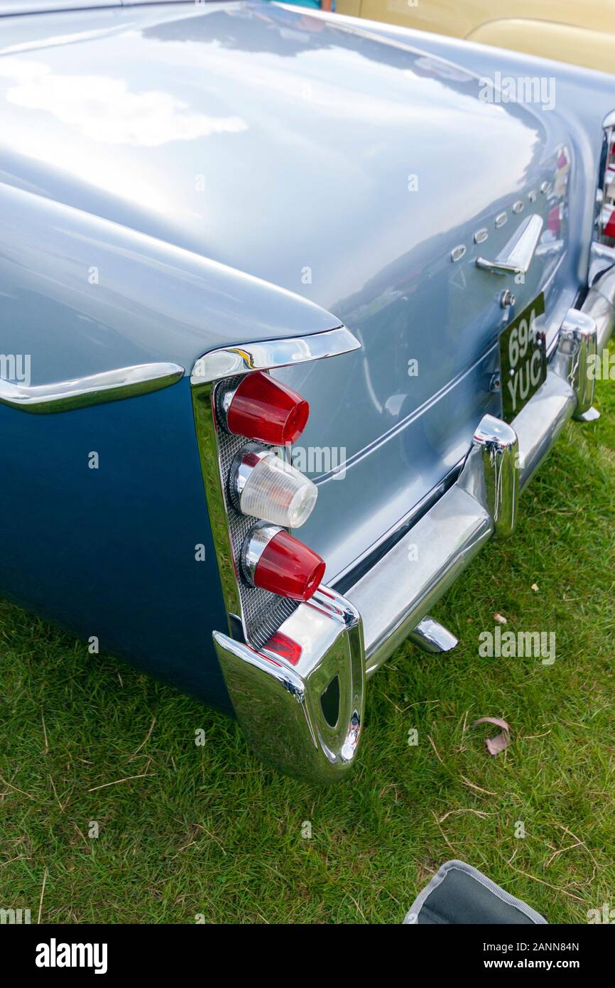 Rear view of a vintage blue Dodge car showcasing classic tail fins and ...