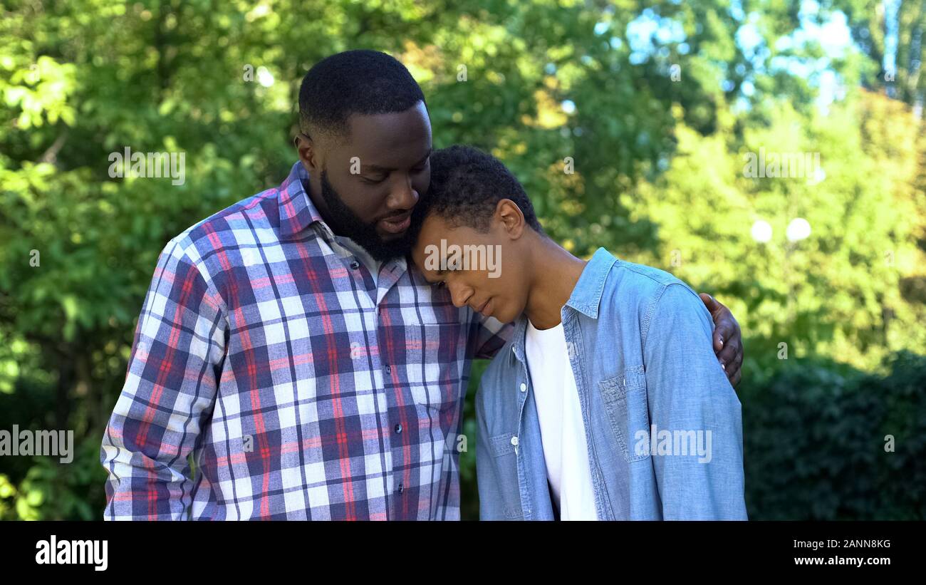 Father hug teen son hi-res stock photography and images - Alamy