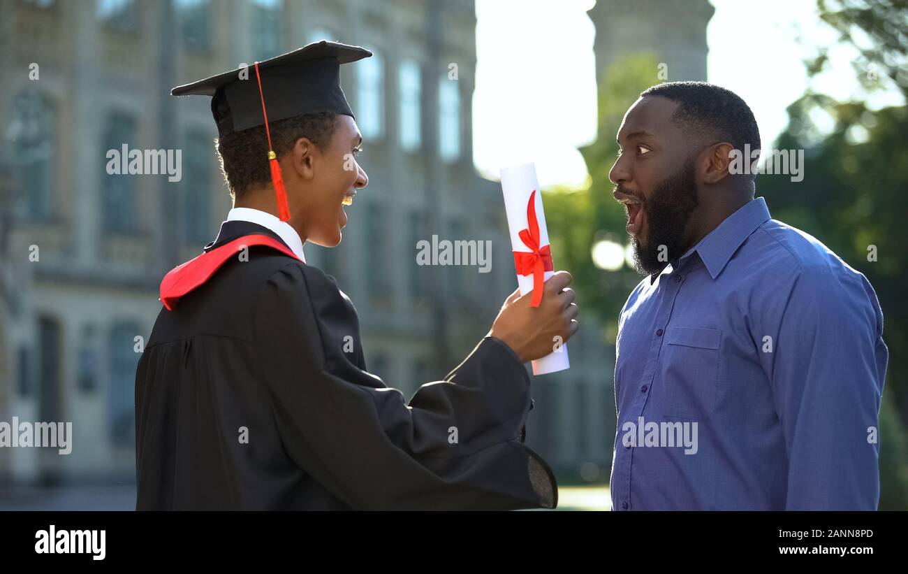African american family son graduation hi-res stock photography and ...