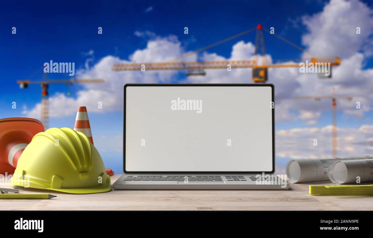 Blank laptop screen and engineering tools on an architect engineer desk ...