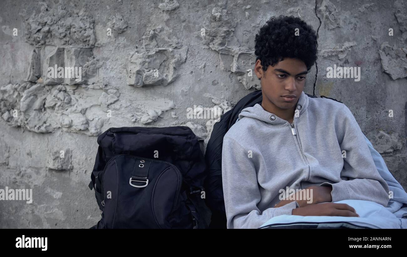 Homeless teen sleeping street hi-res stock photography and images - Alamy