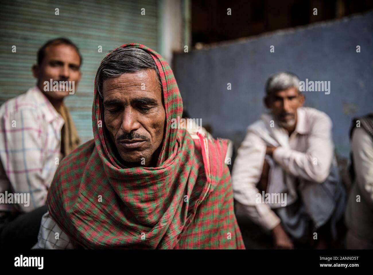 Man taking a break in New Delhi spice market. India Stock Photo - Alamy