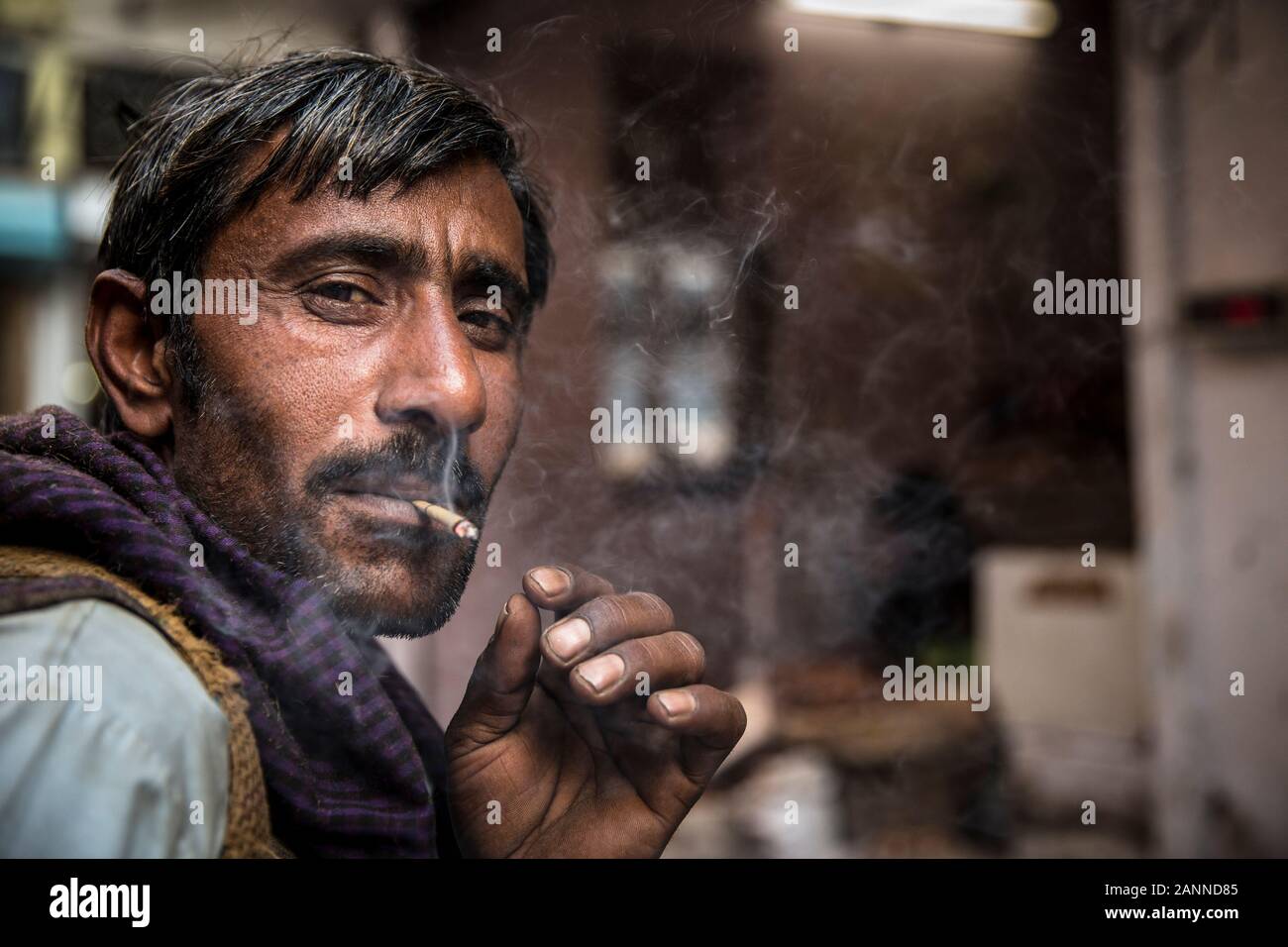 Asian worker smoking hi-res stock photography and images - Alamy