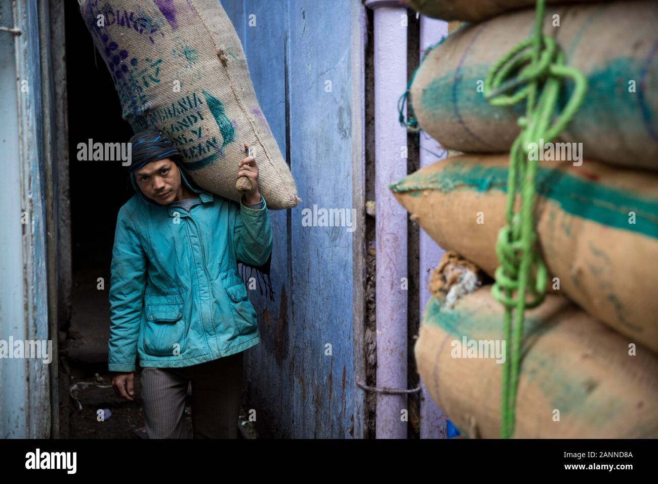 Man carrying carrier bag hi-res stock photography and images - Alamy