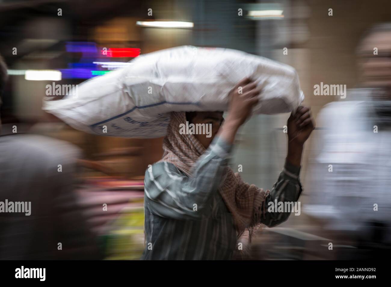 Man carrying carrier bag hi-res stock photography and images - Alamy