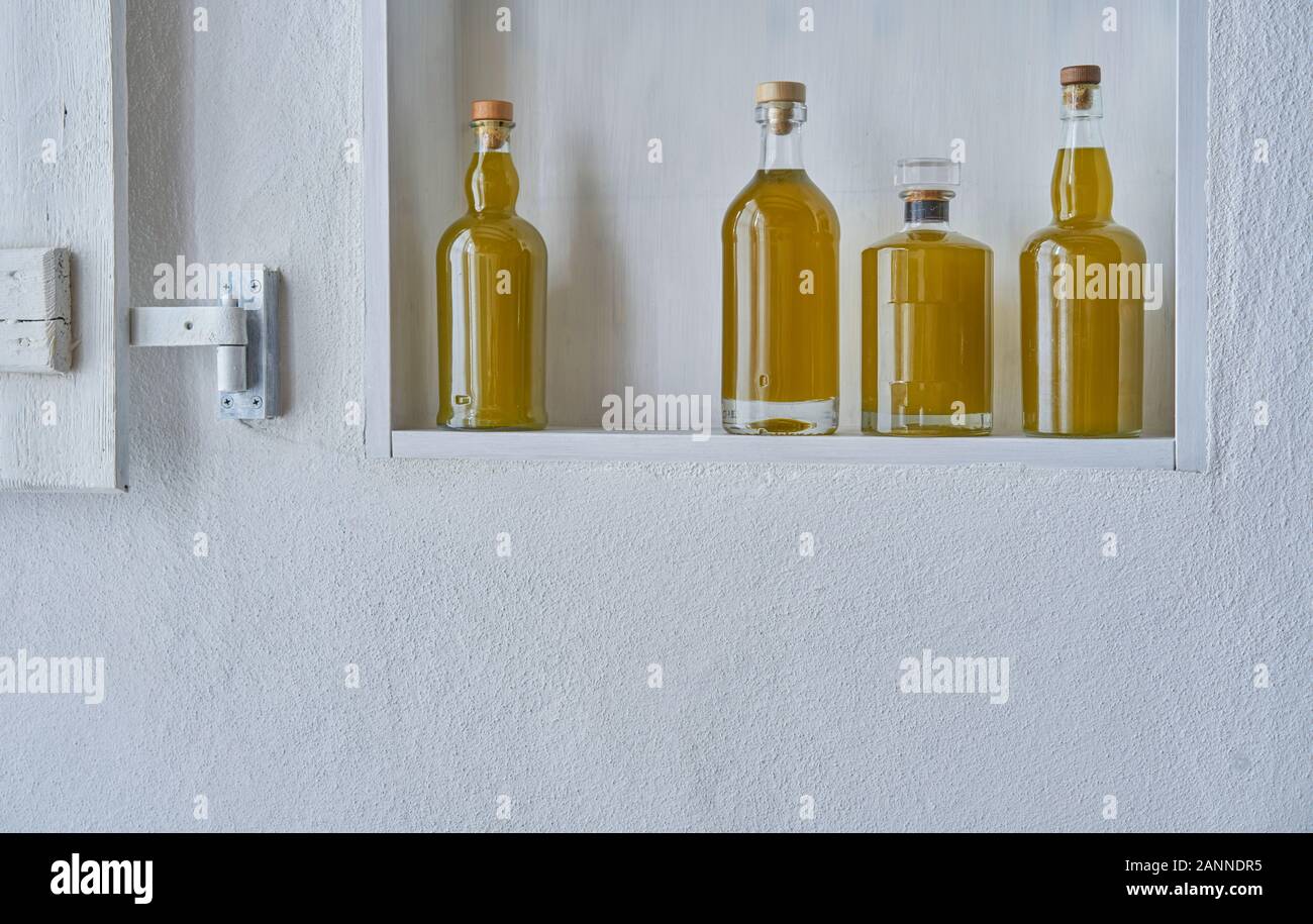 bottle bottles kitchen shelf olive oil bottle oils four copy space food ...