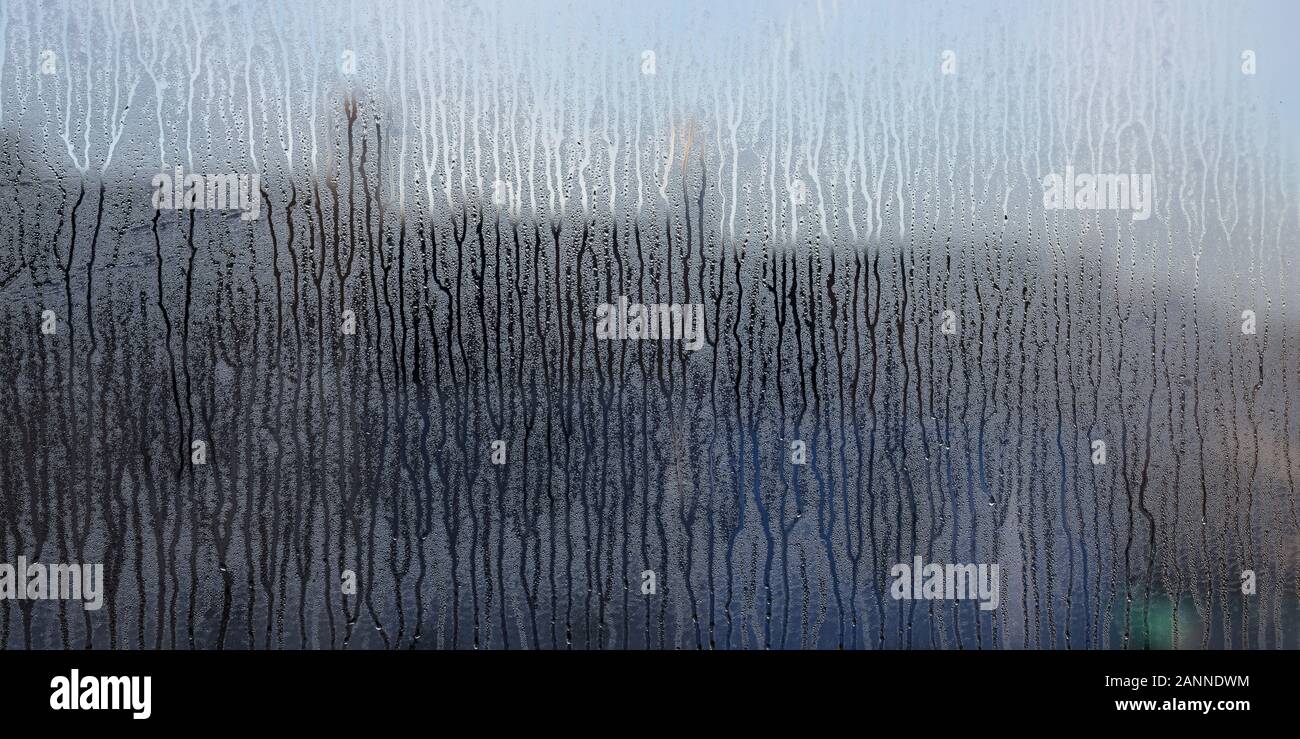 Cold weather outdoors can cause condensation on the window Stock Photo ...