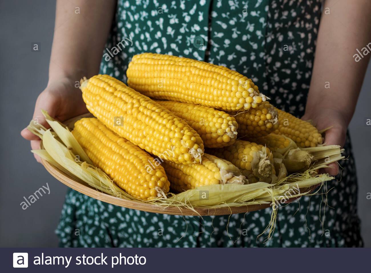 Woman With Corn On The Cob High Resolution Stock Photography and Images ...
