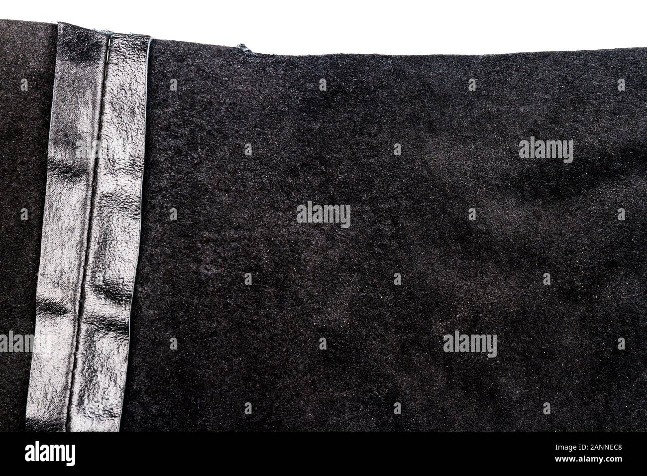 Piece of black leather isolated on white background. Crumpled material ...