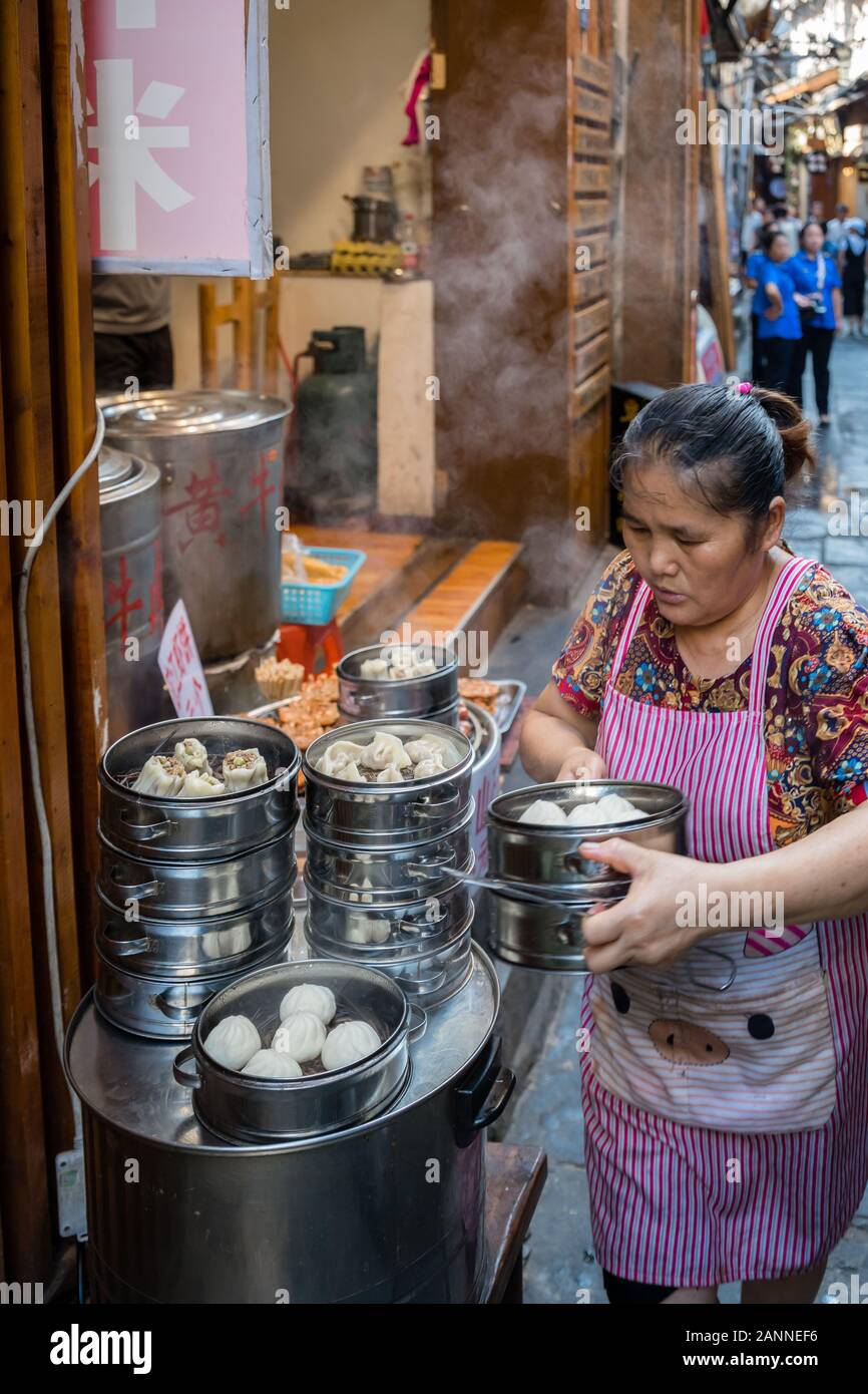 Old asian woman bakery hi-res stock photography and images - Alamy