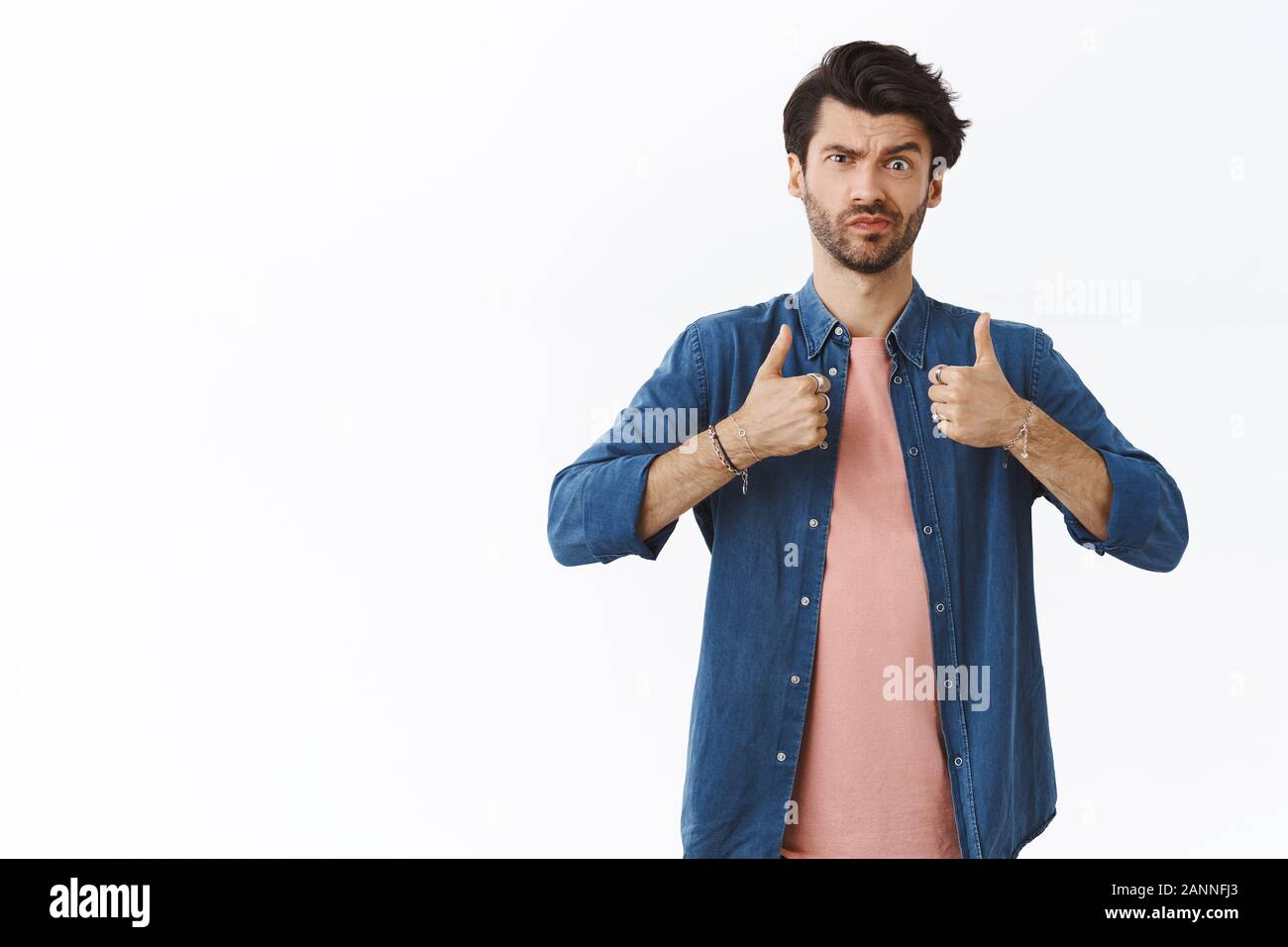 Judgemental funny bearded guy try looking serious, smirk and frowning ...